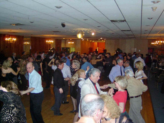 Louis Del Prete with various dancers