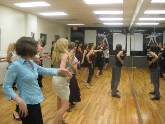 Louis Del Prete with various dancers